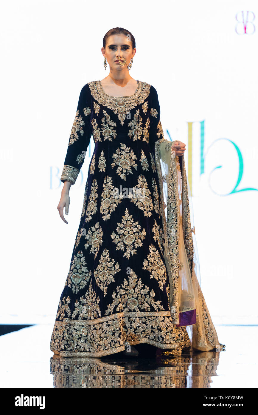 London, UK. 7th October 2017. A model presents a look by Mirza Miha of ...