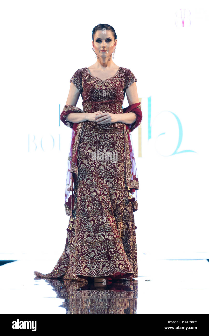 London, UK. 7th October 2017. A model presents a look by Mirza Miha of ...