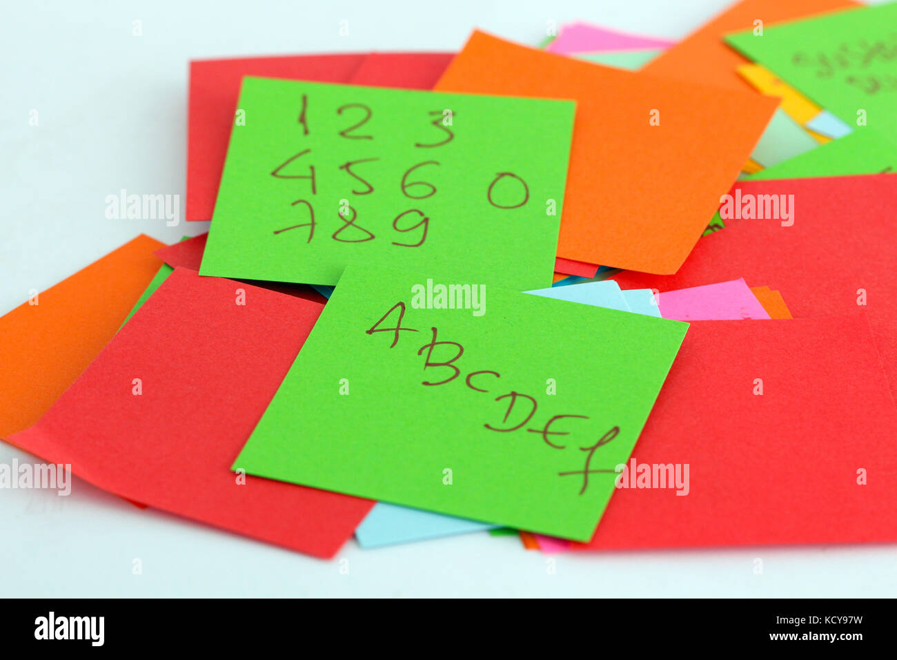 picture of a Note papers on white background,numbers and letters Stock ...
