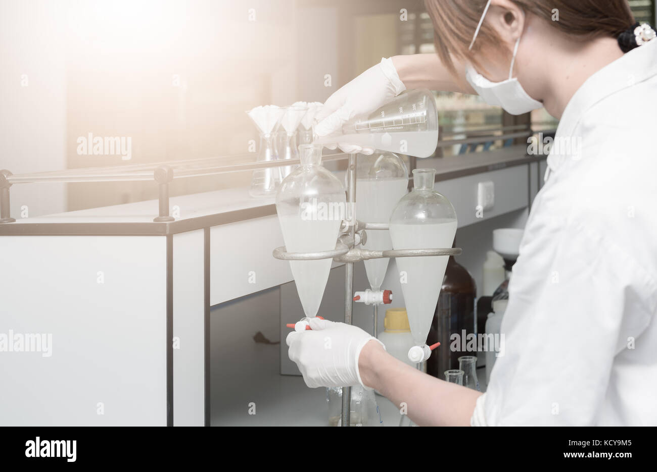 Scientist working in laboratory, testing samples, science technology ...