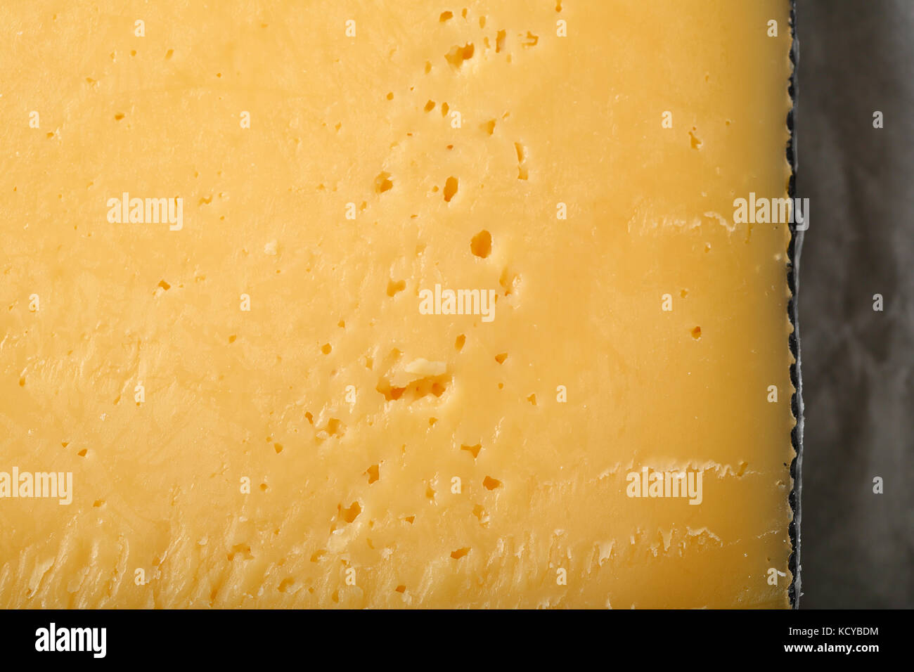 Yellow cheese closeup, food above Stock Photo - Alamy