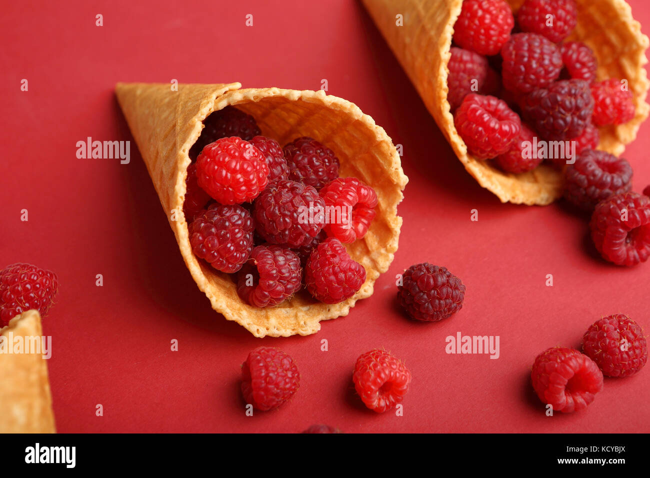 raspberry in waffle cones, food closeup Stock Photo - Alamy