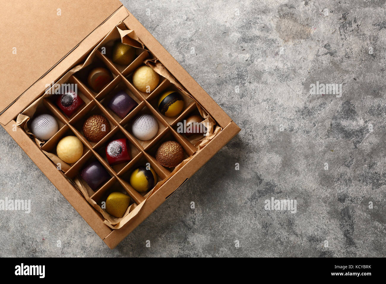 Small box full of candies, food above Stock Photo - Alamy