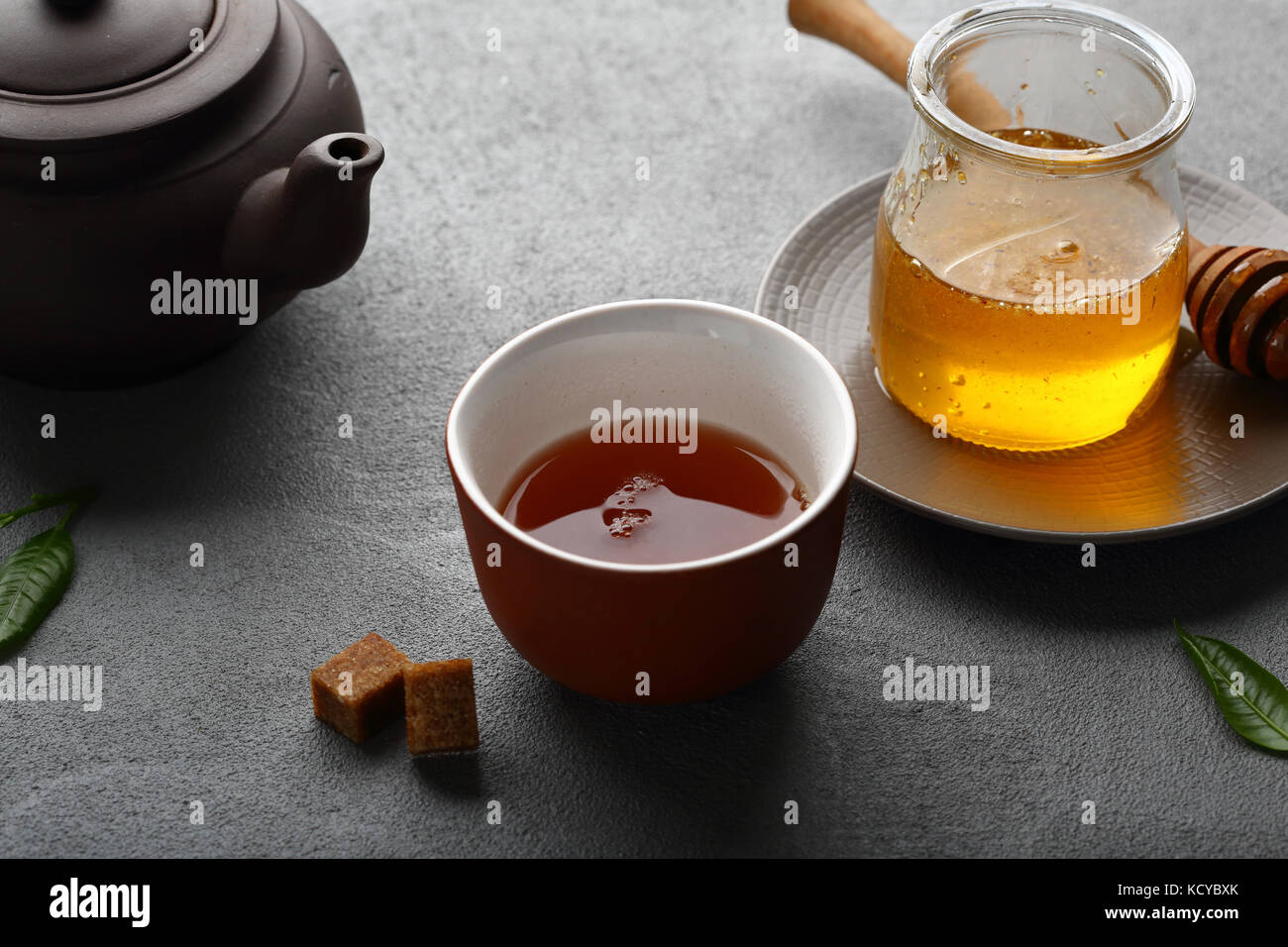 Black Tea composition with honey, food and drink Stock Photo - Alamy