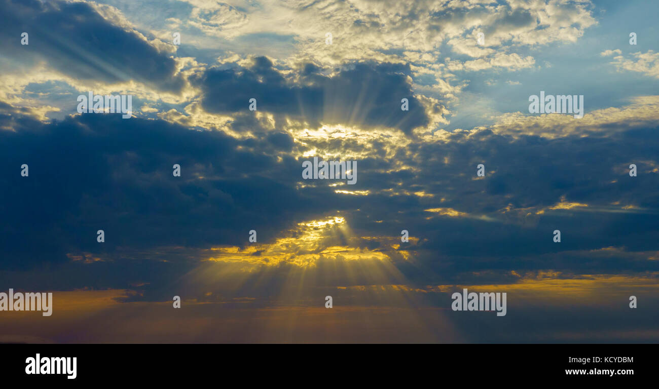 Beautiful clouds at sunset with sunligh Stock Photo - Alamy