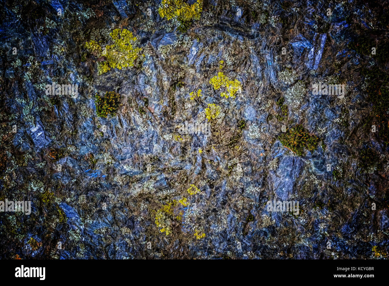 Natural hard rock or stone texture surface as background. Darken from ...
