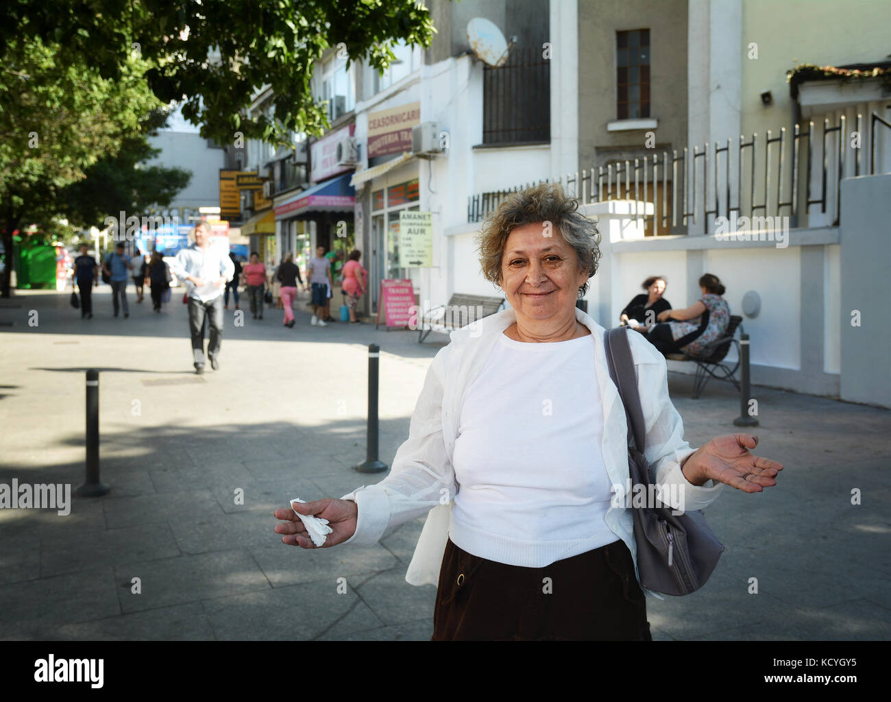 People in Bucharest, historical center of the capital of Romania. Woman ...