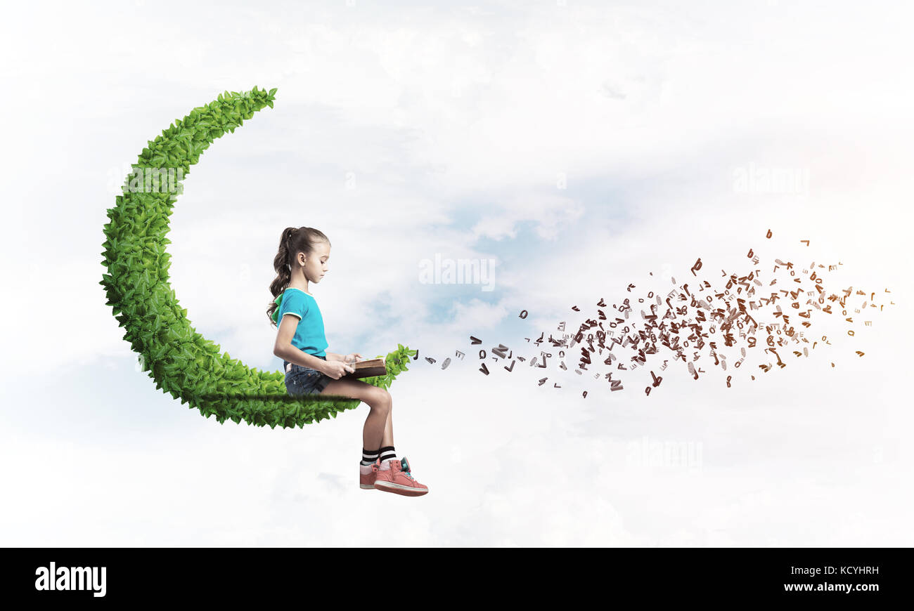 Concept of careless happy childhood with girl on green moon Stock Photo ...