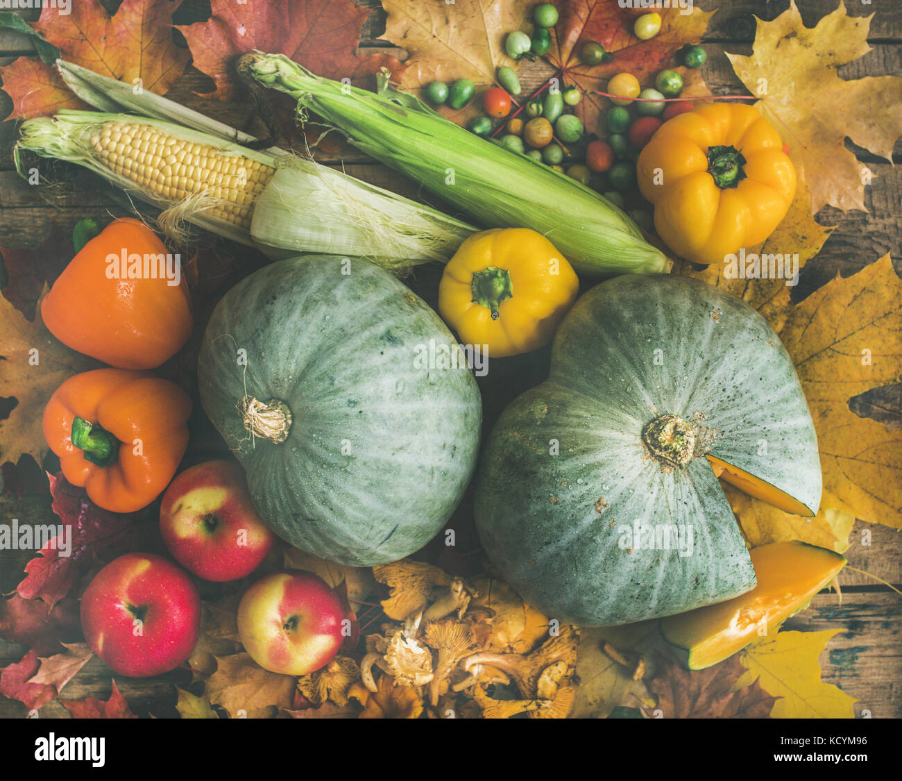 Fall vegetables assortment over wooden table background Stock Photo - Alamy