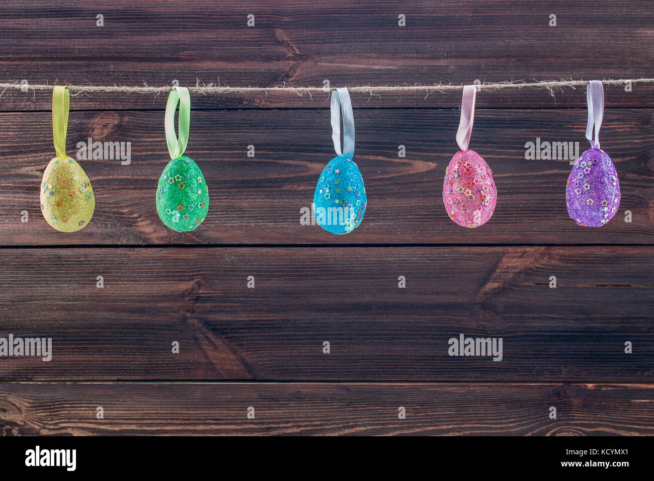 Easter eggs on a string Stock Photo - Alamy
