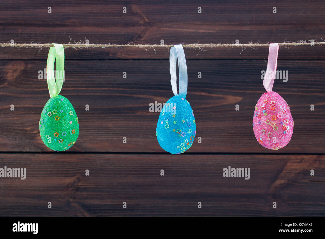 Easter eggs on a string Stock Photo - Alamy