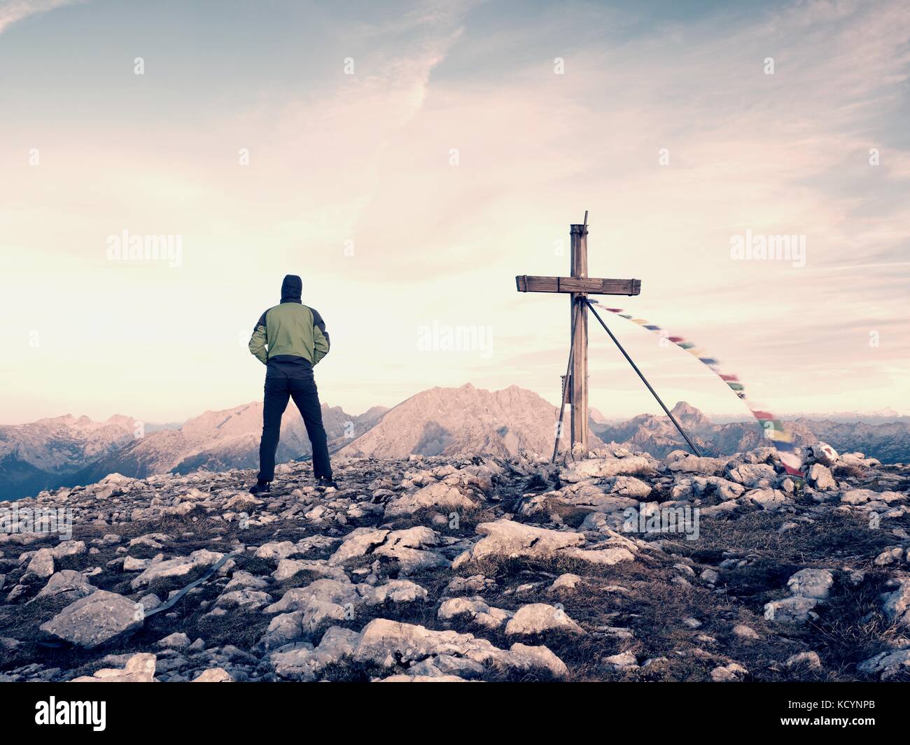 Man praying on summit mountain hi-res stock photography and images - Alamy