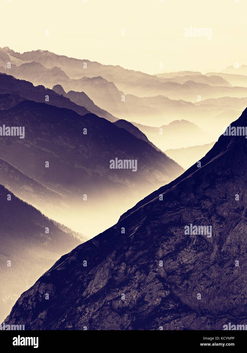 View over high sharp mountain peaks from plane, beautiful view ...