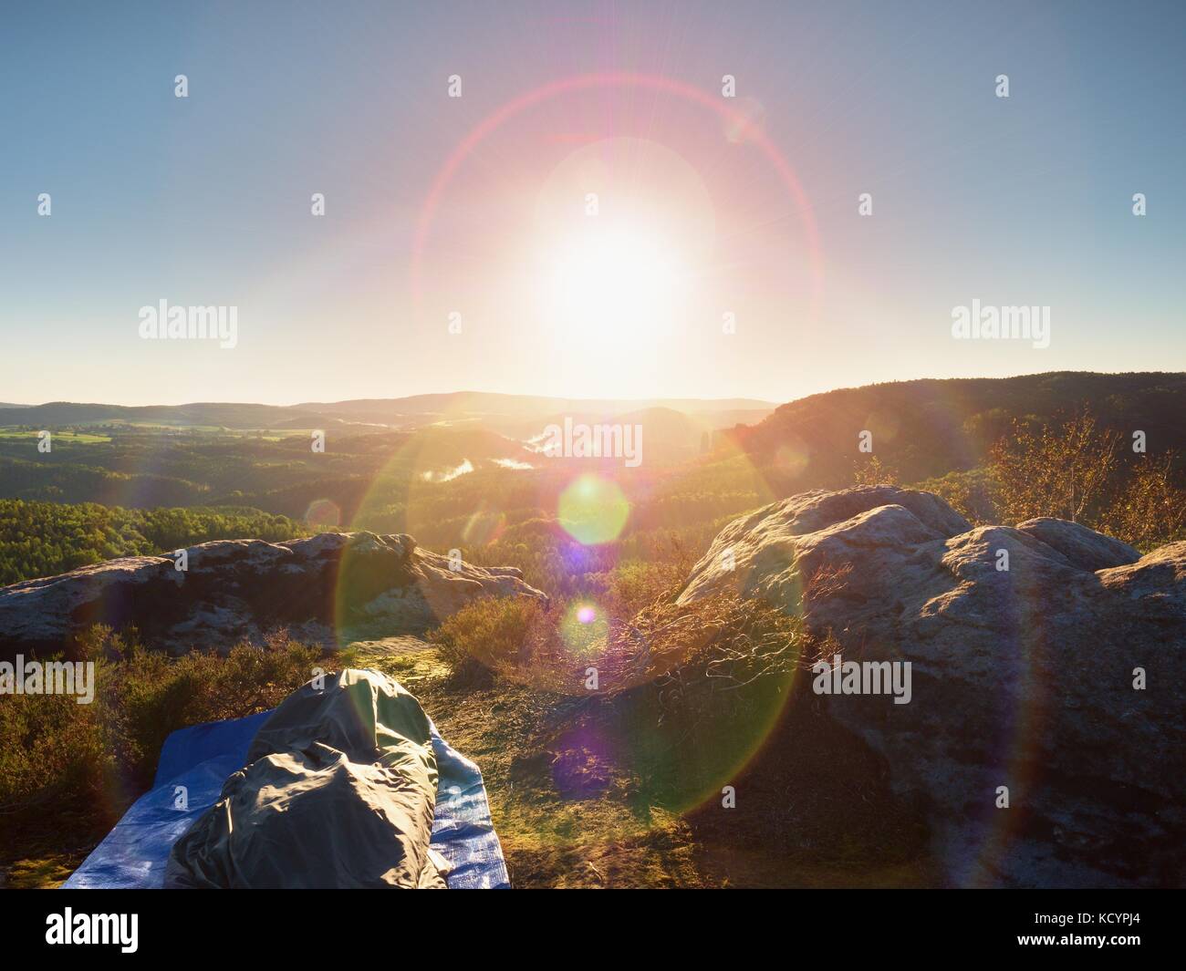 Bivouacing in nature. Sleeping on the ground in a sleeping bag on a ...