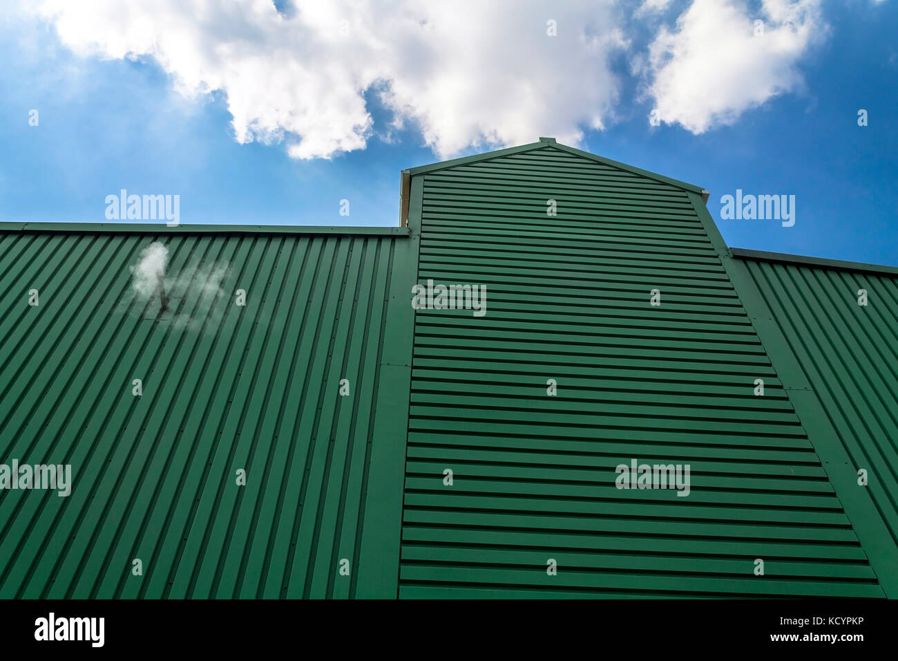 Warehouse exterior on a blue sky Stock Photo - Alamy