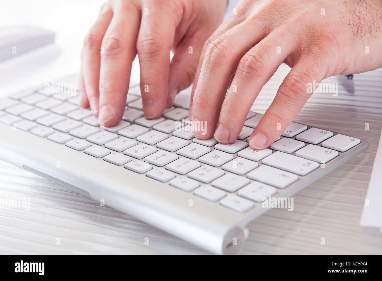 Male hands on computer keyboard hi-res stock photography and images - Alamy