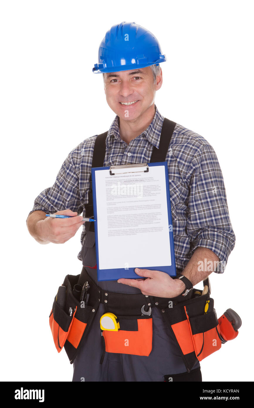 Happy Technician Pointing On Clipboard Over White Background Stock ...