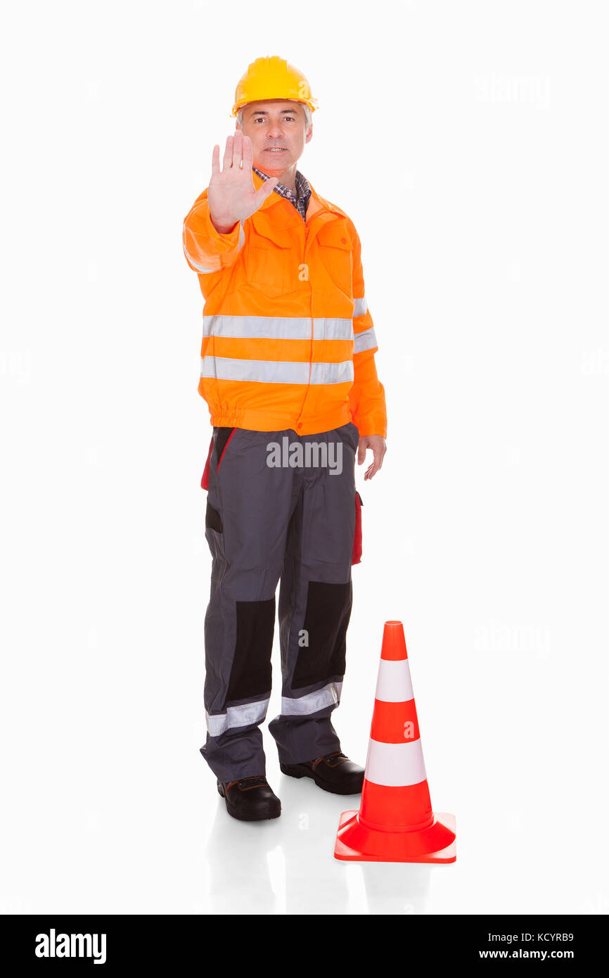 Man Showing Stop Sign Over White Background Stock Photo - Alamy