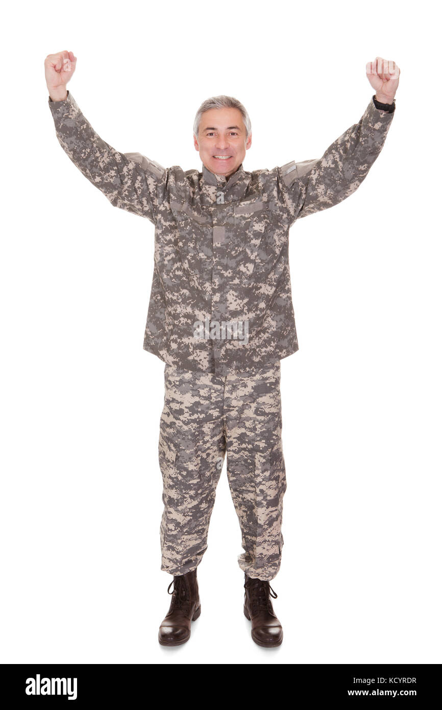 Mature Soldier Raising His Arm Isolated On White Background Stock Photo ...