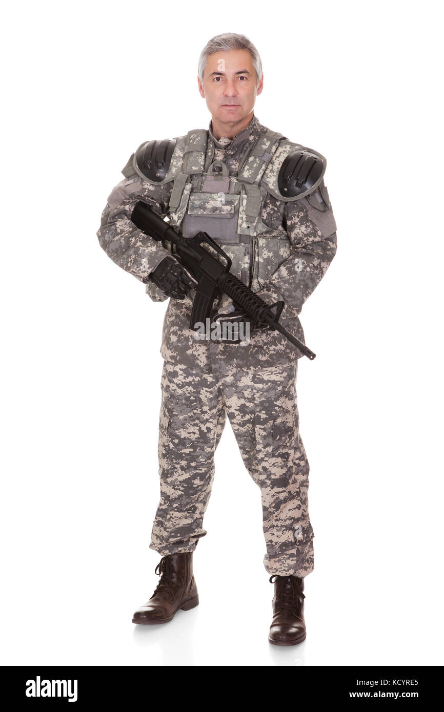 American Soldier Standing With Gun