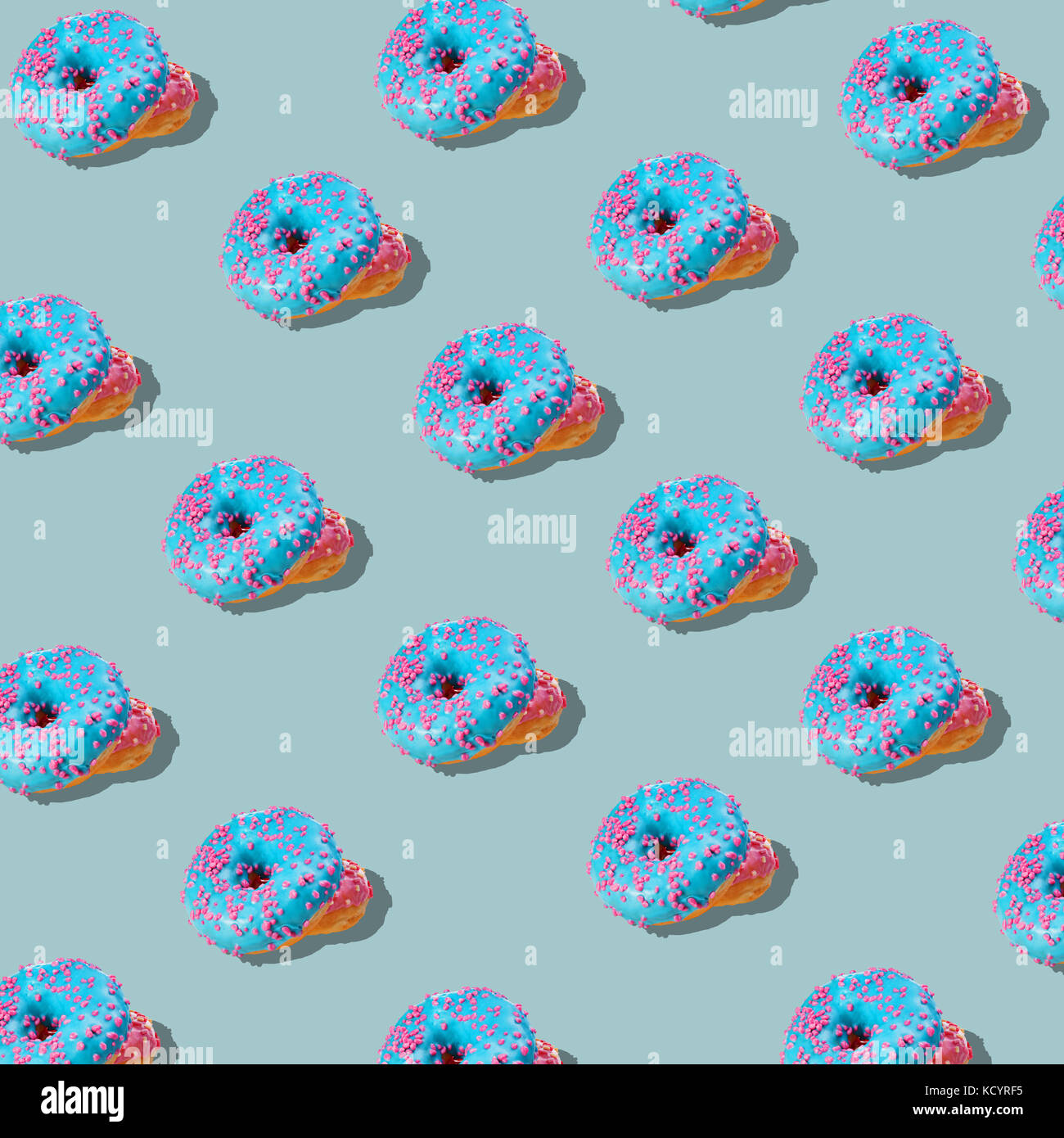 Blue glazed donut pattern on blue pastel background. Creative concept ...
