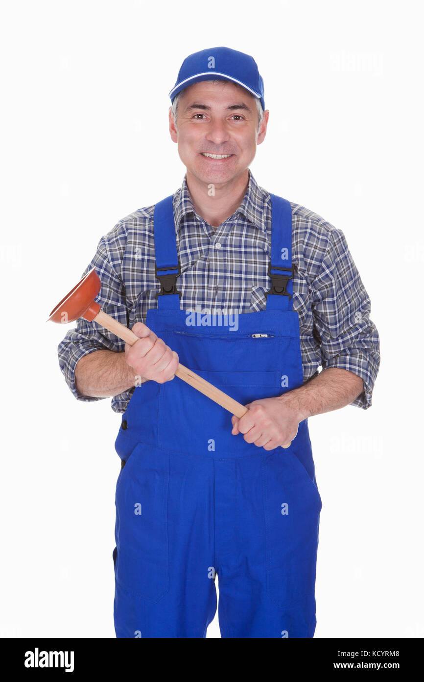 Portrait Of Male Plumber Holding Plunger Over White Background Stock ...