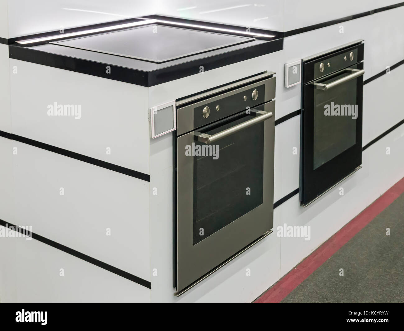 In the store on display demonstrates modern electric oven Stock Photo ...