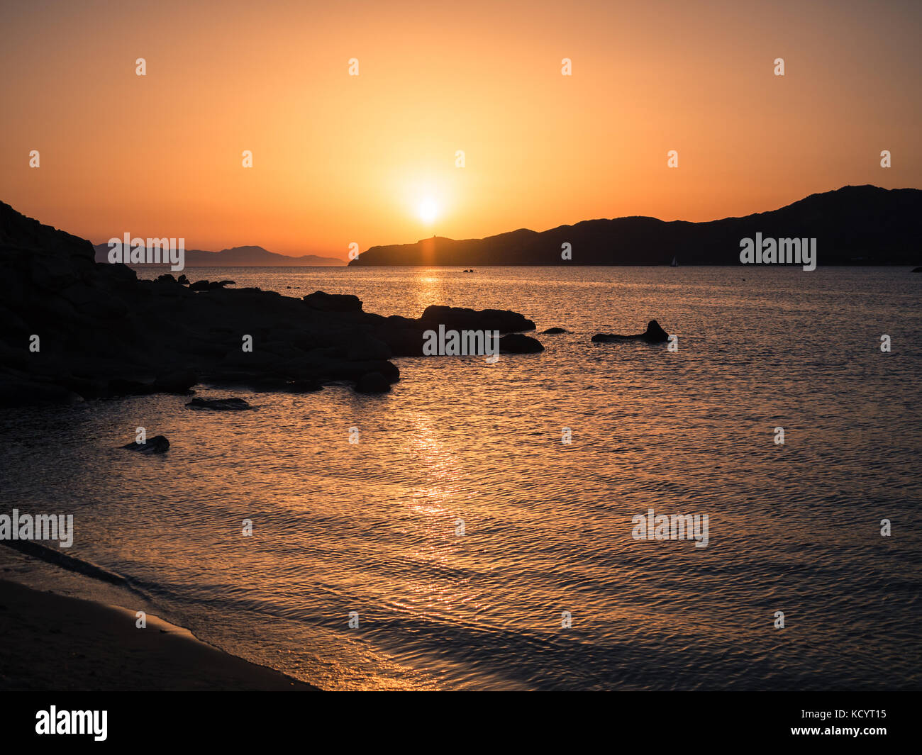 The sun sets over the sea in the wonderful Sardinia, Italy Stock Photo ...