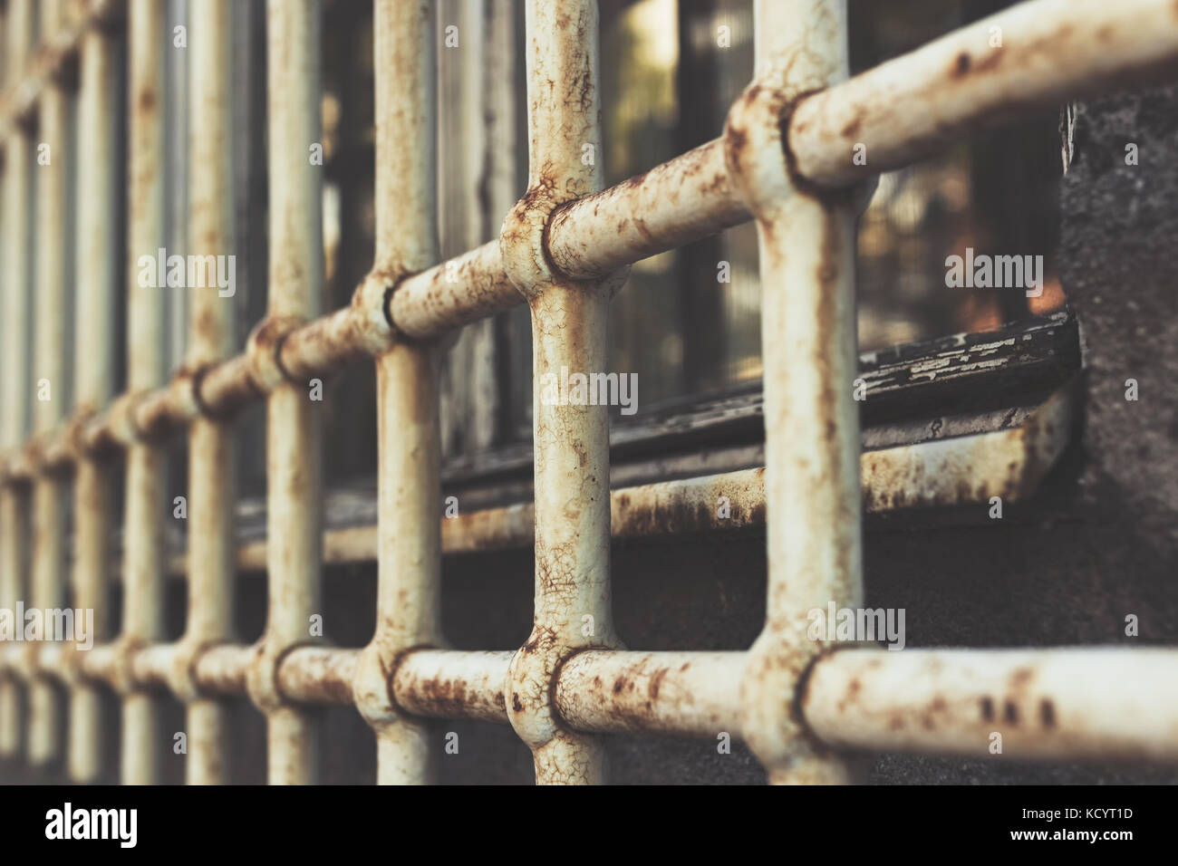Close up of rusty security grids on a window Stock Photo - Alamy