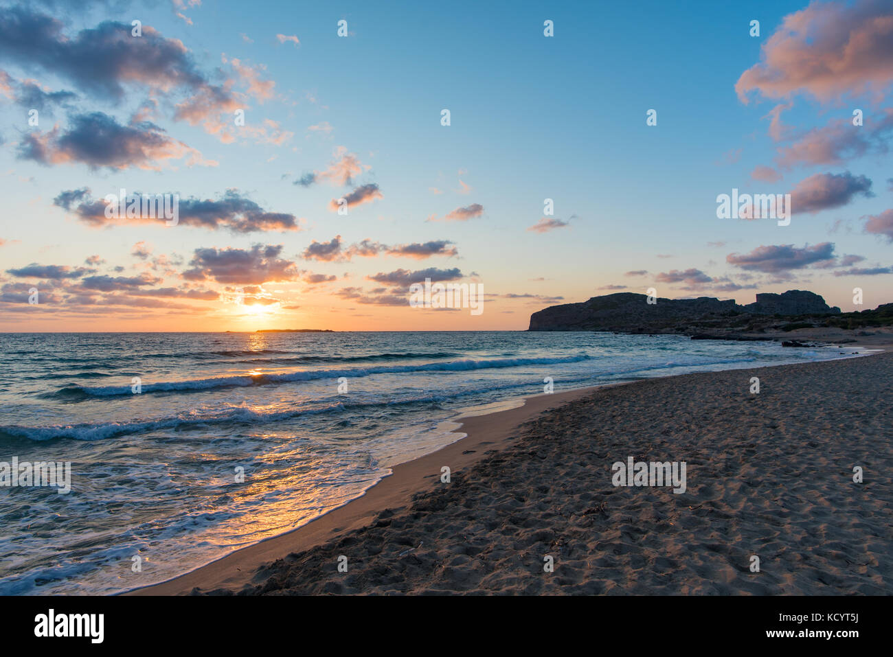 Hot summer evening sunset at the sea in Falasarna beach Stock Photo - Alamy