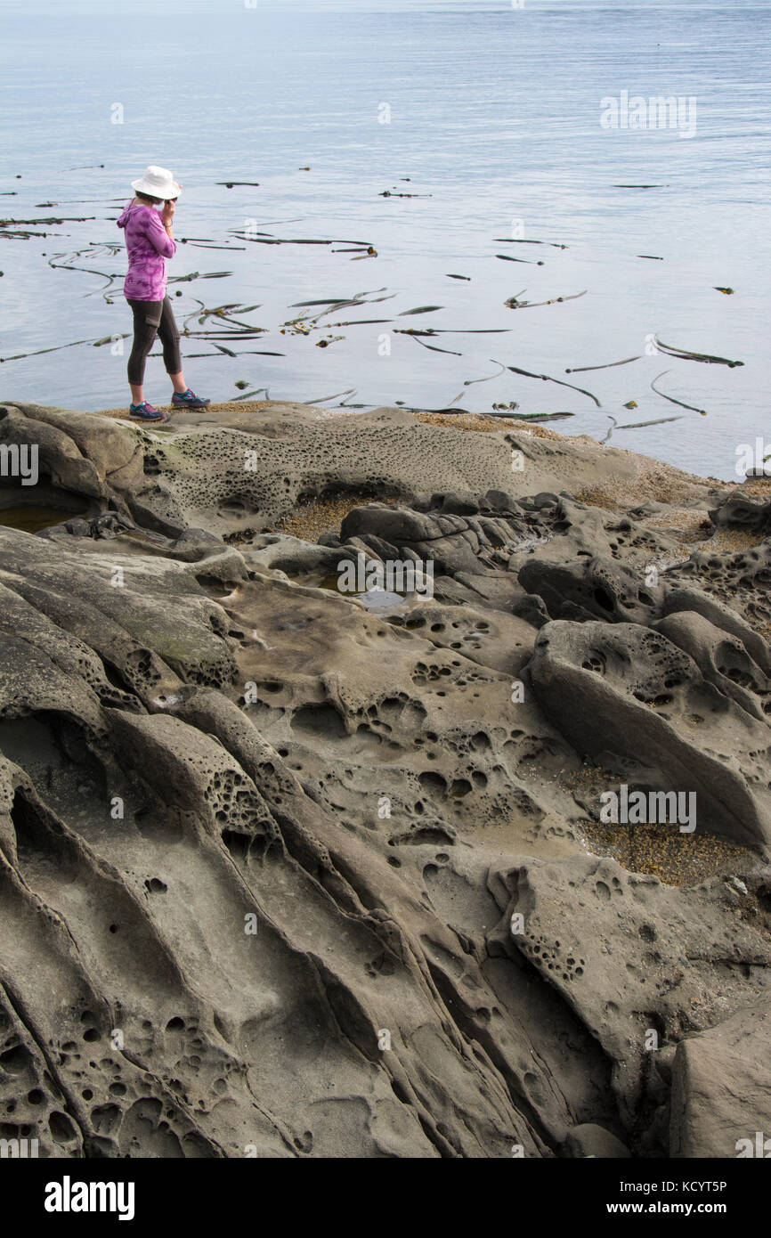 Woman on Seashore at Isle-De-Lis Marine Park, located on Rum Island ...
