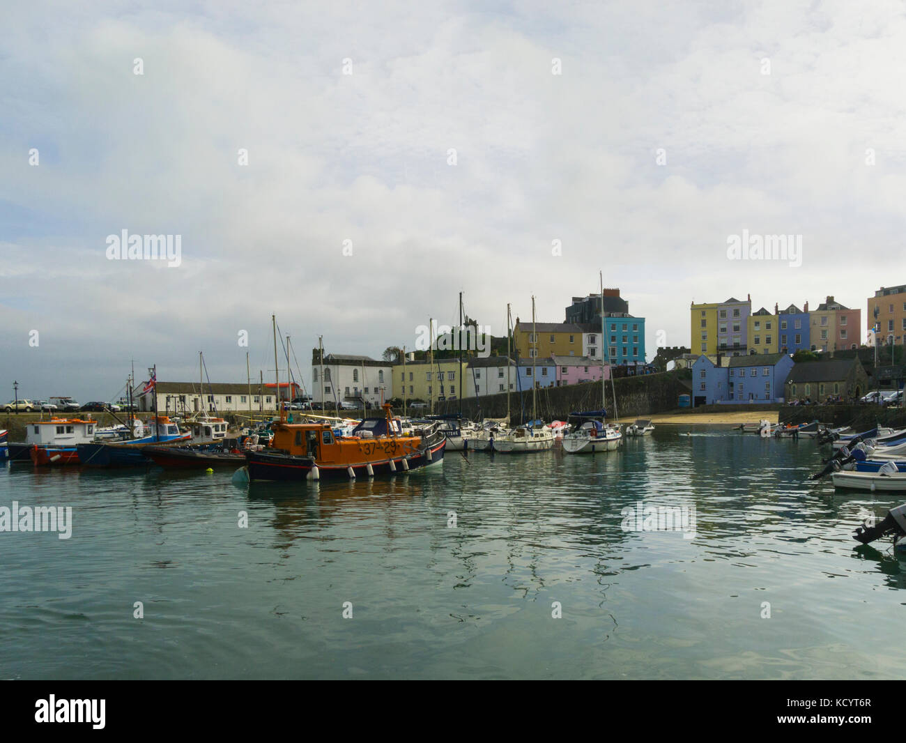 Tenby Harbour Pembrokeshire South West Wales with moored leisure craft ...