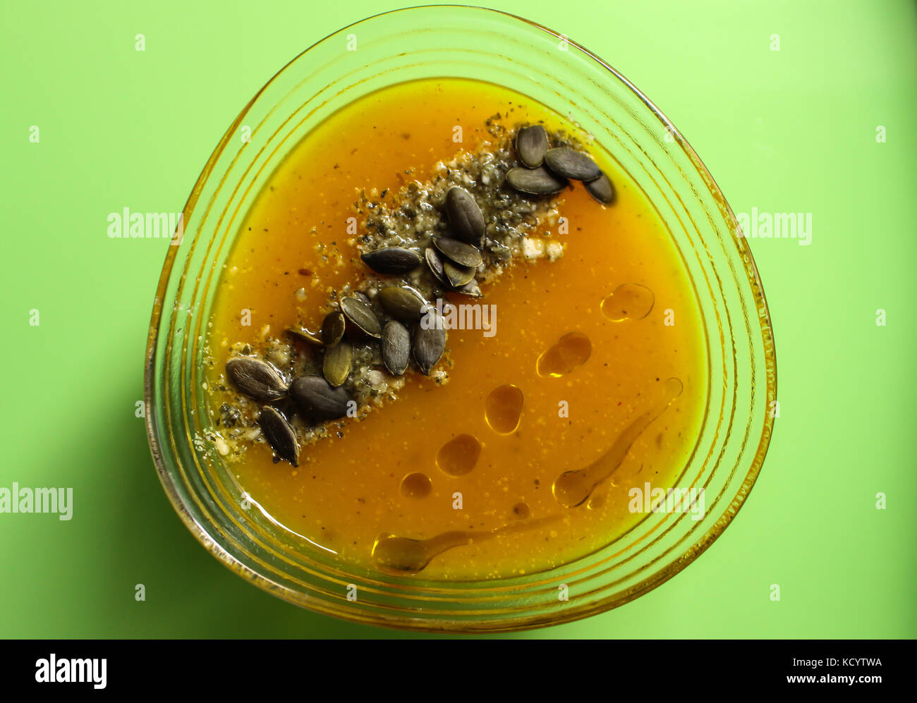 Top view of a boul with yellow soup Stock Photo - Alamy