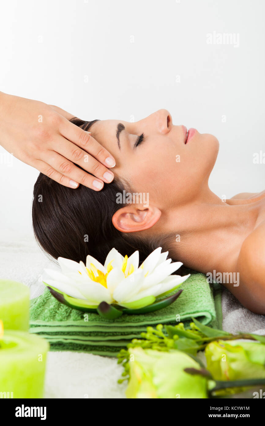 Beautiful Young Woman Relaxing In Spa Saloon Stock Photo - Alamy
