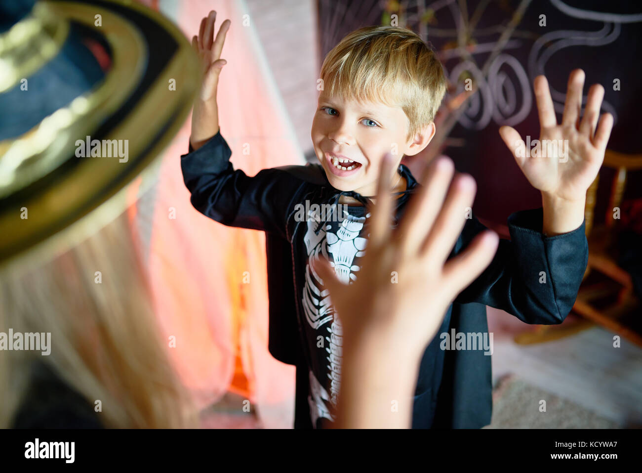 Portrait of little children having fun on Halloween, focus on cute ...