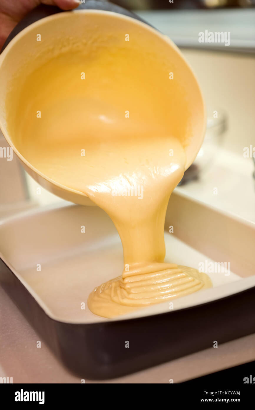 Baking cake cake batter pouring hi-res stock photography and images - Alamy