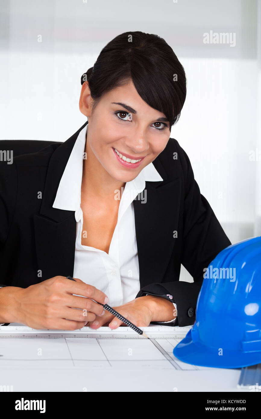 Female architect drafting blueprint ruler hi-res stock photography and ...