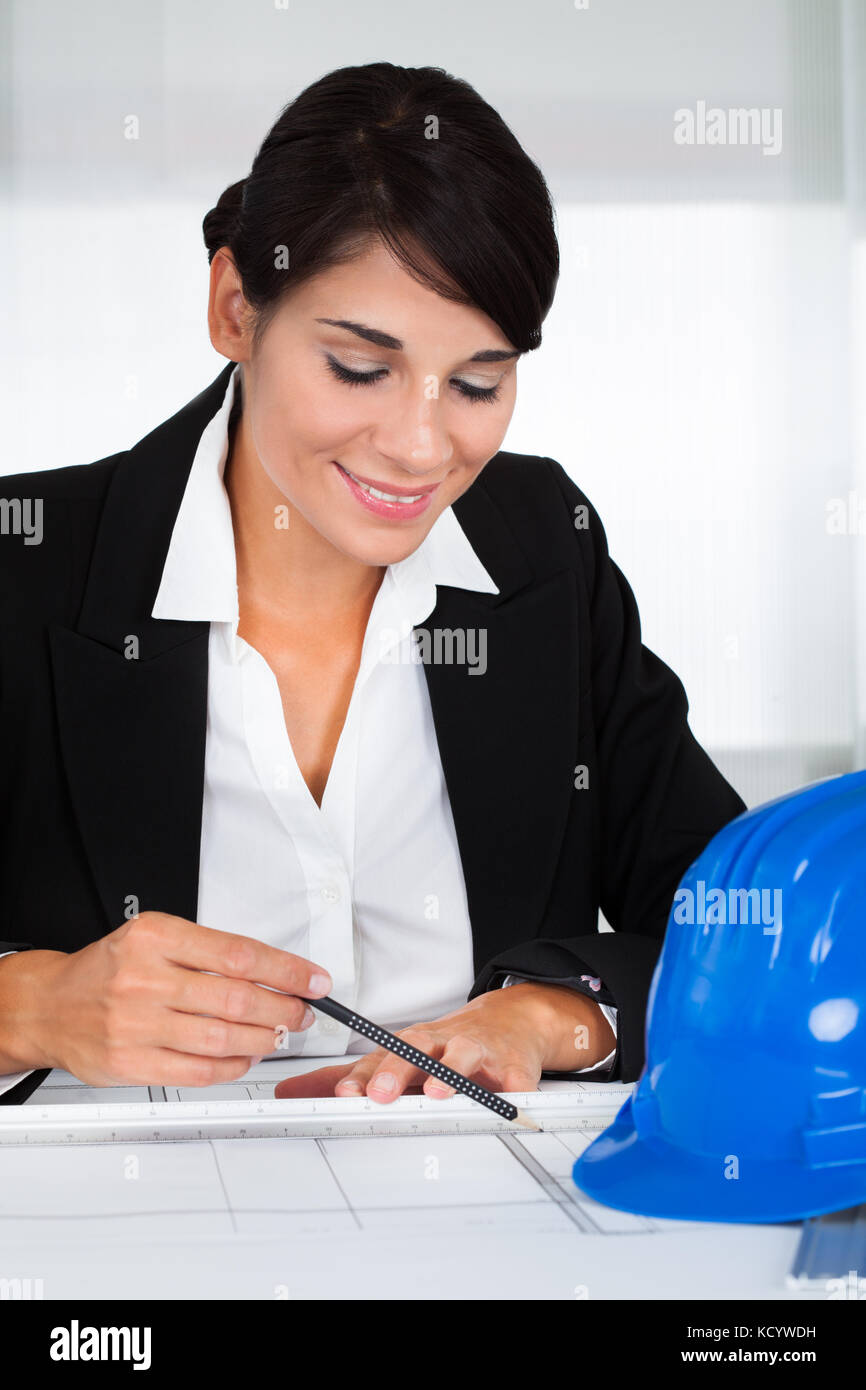 Female architect drafting blueprint ruler hi-res stock photography and ...