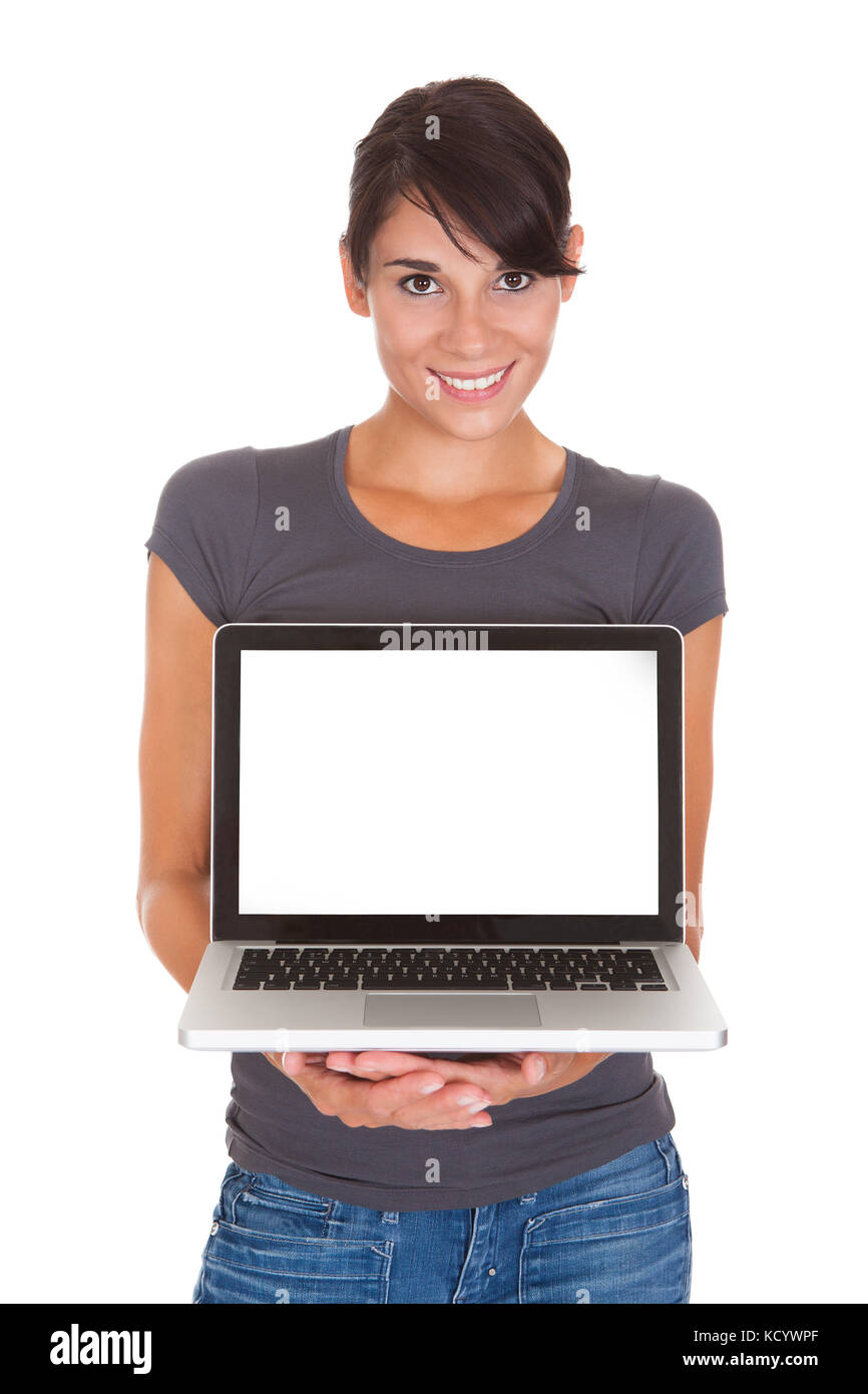 Young Happy Woman Holding Laptop Over White Background Stock Photo - Alamy