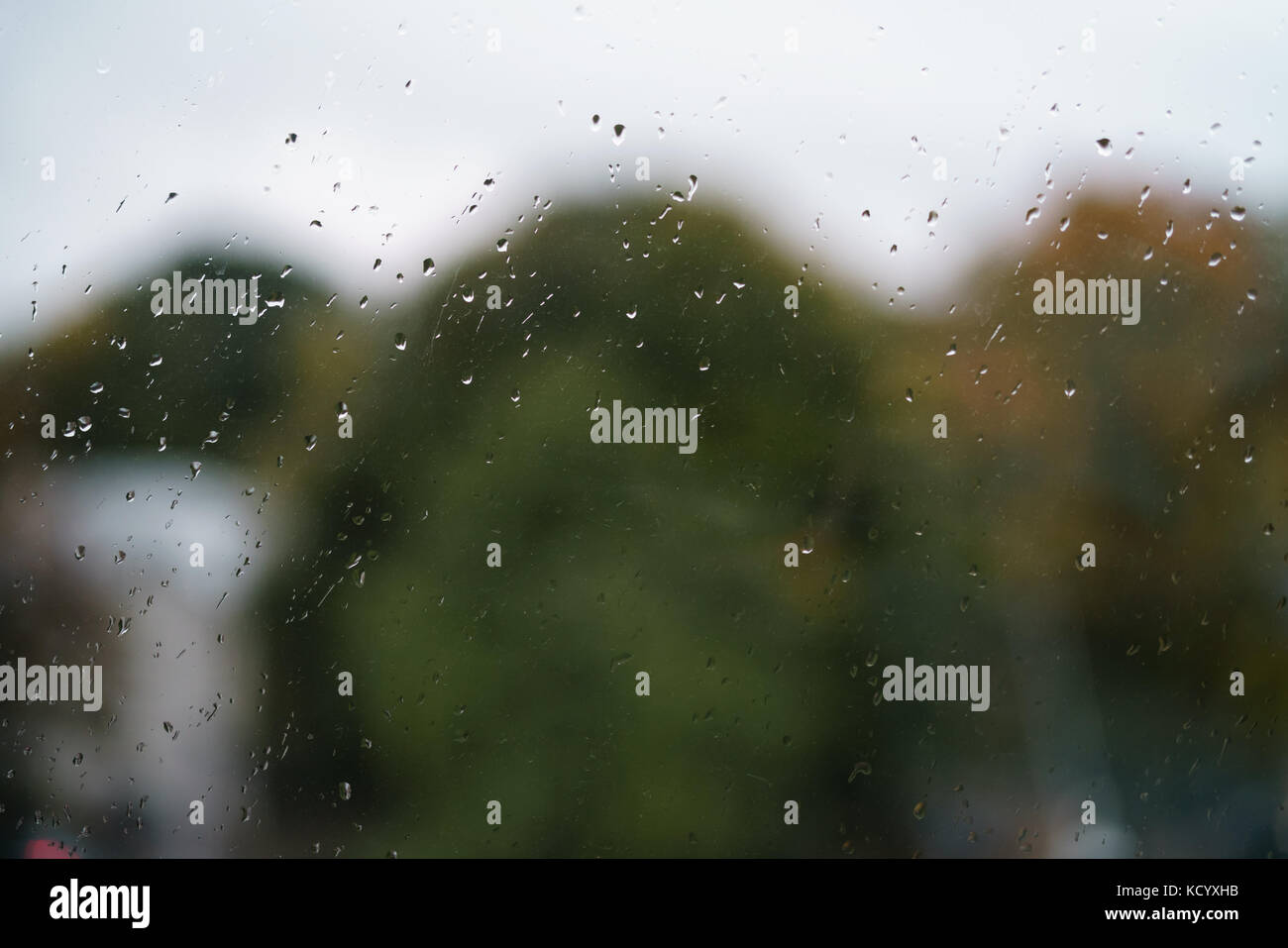 raindrops on window in autumn on high floor Stock Photo - Alamy