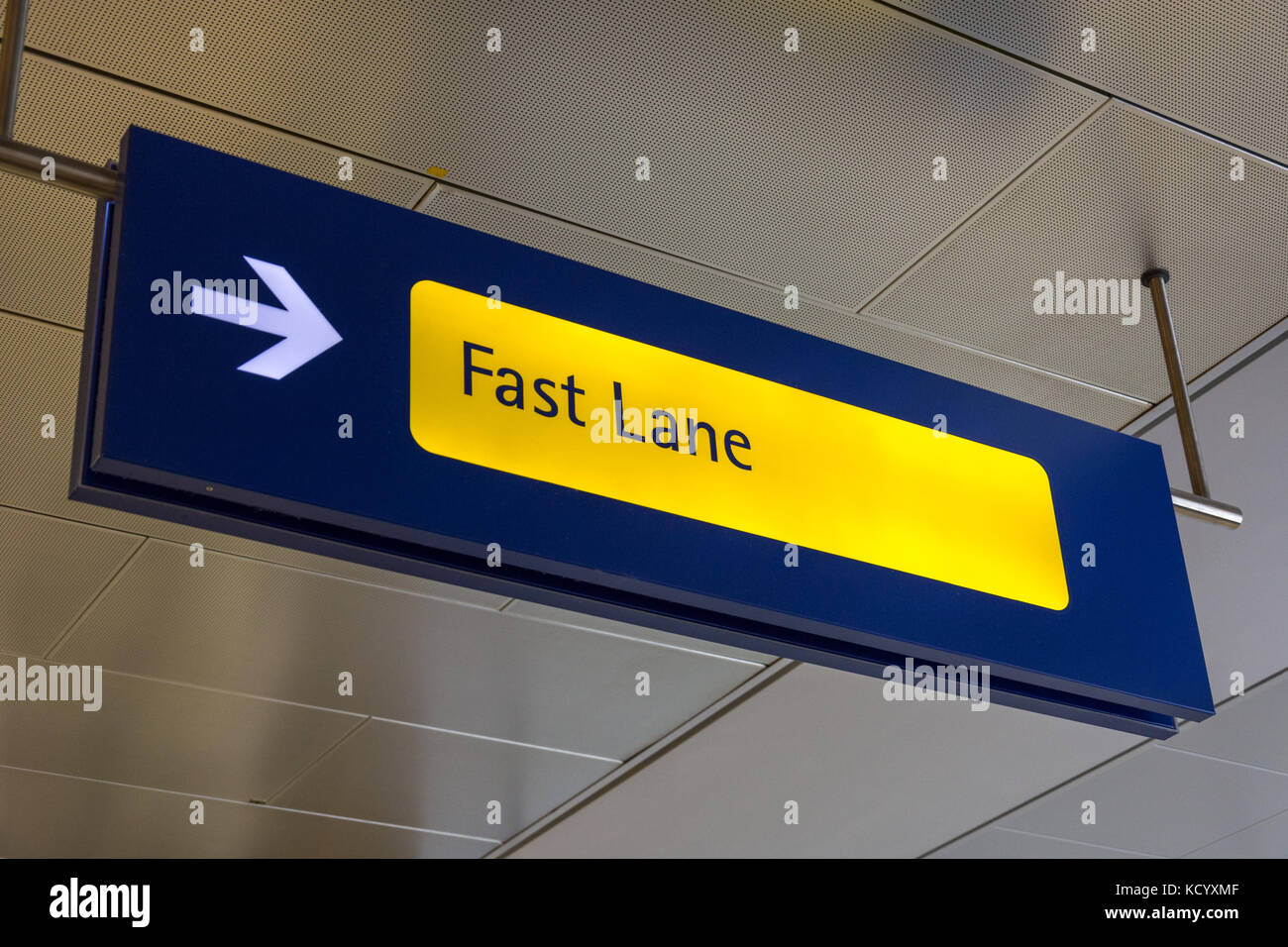 Fast Lane sign in blue and yellow at the airport close up Stock Photo ...