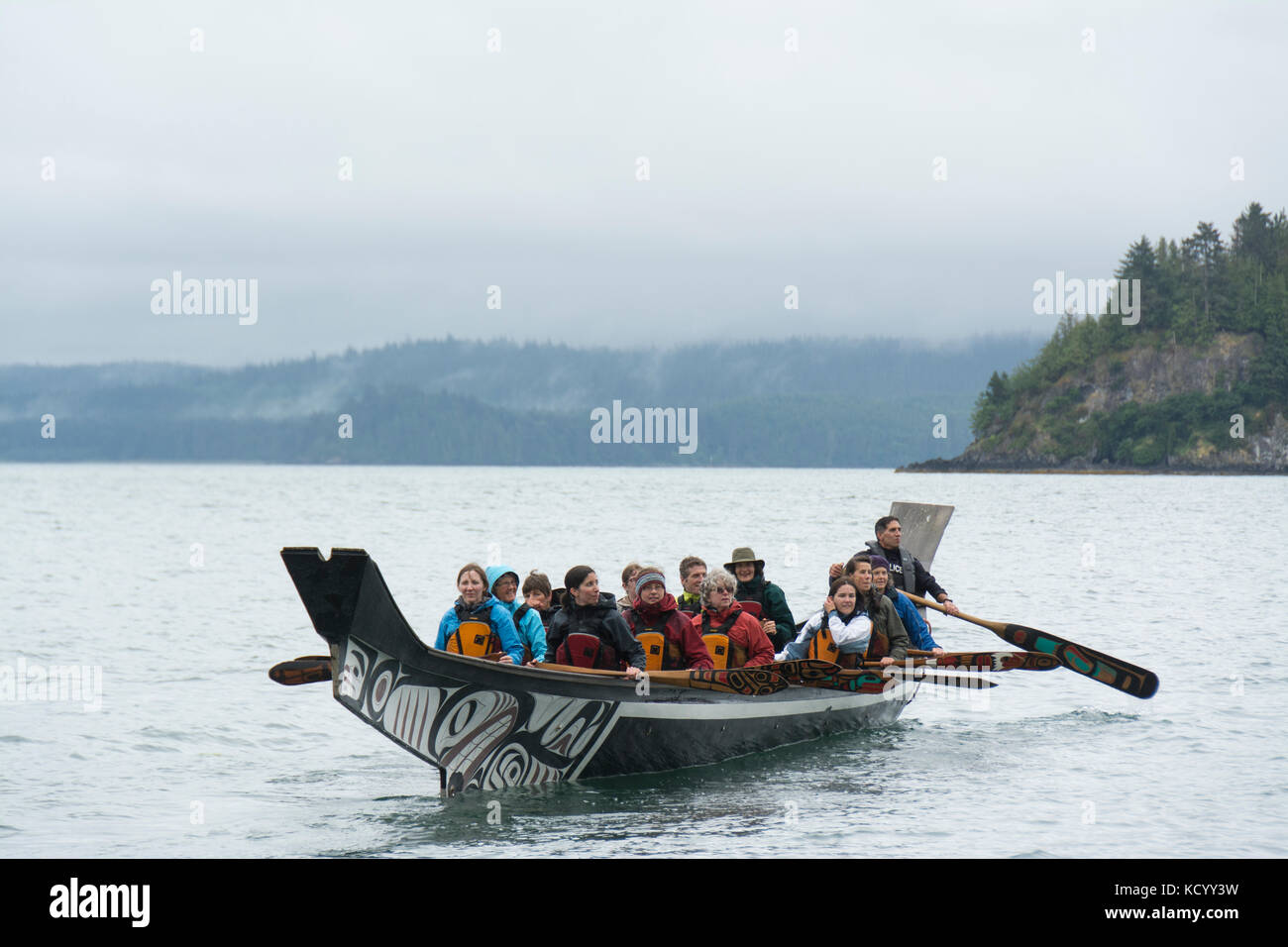 Visitors paddle Loo Plex, replica of the Bill Reid cedar canoe, Lootaas ...