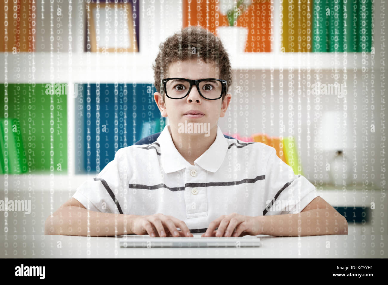 Child using a computer with binary code on the screen Stock Photo - Alamy