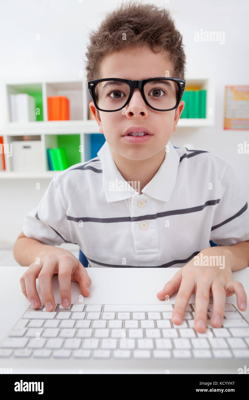 young boy playing a computer game Stock Photo - Alamy
