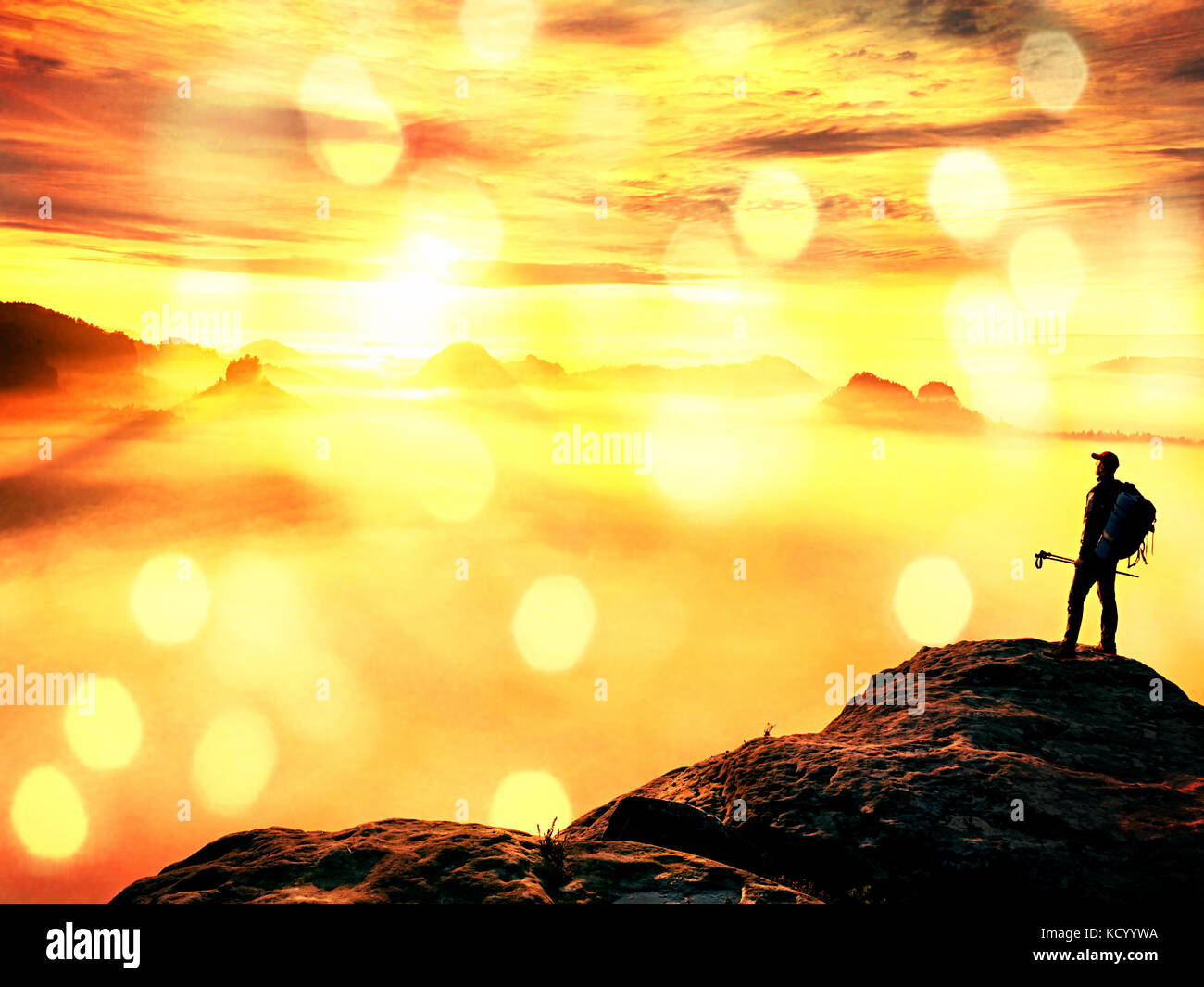 Lens defect. Man silhouette with poles in hand. Sunny spring daybreak ...