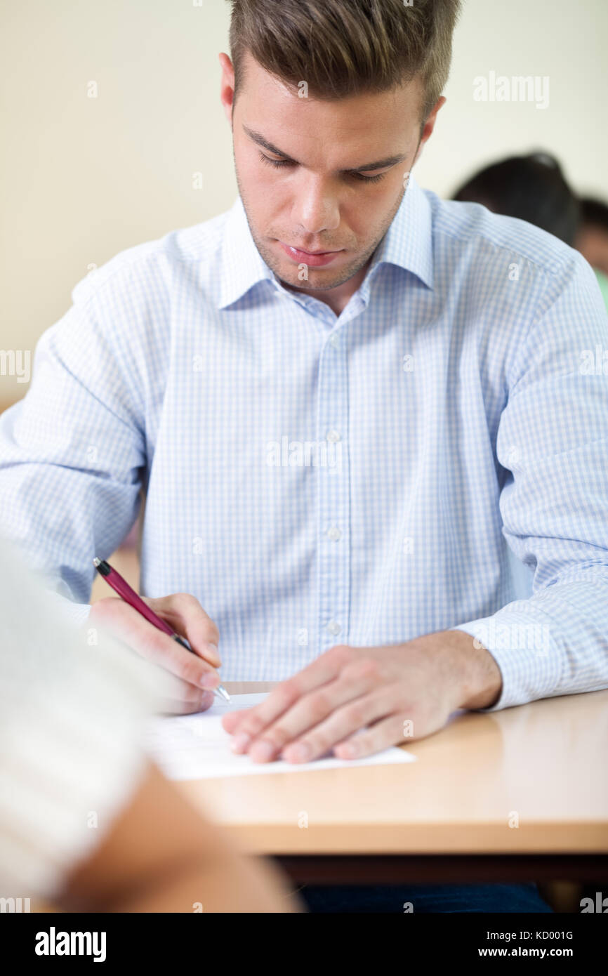 High school students writing notes hi-res stock photography and images ...