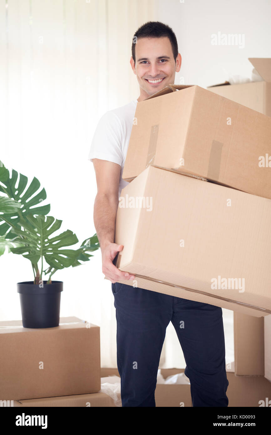 young man in process of moving house Stock Photo - Alamy