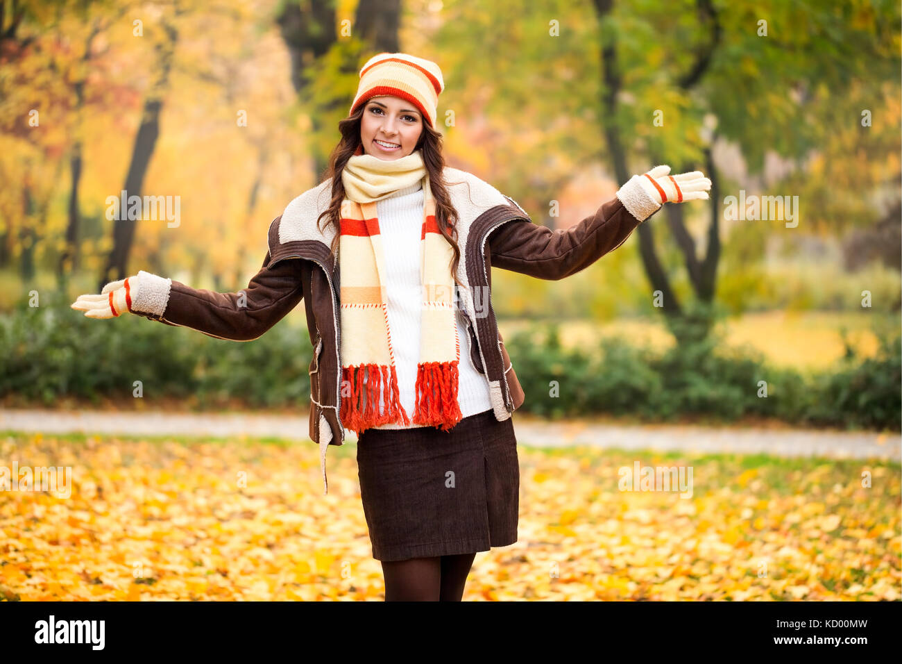 Happy autumn girl standing autumn forest Stock Photo - Alamy