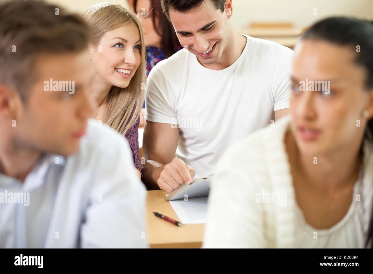 Young students having fun during class Stock Photo - Alamy
