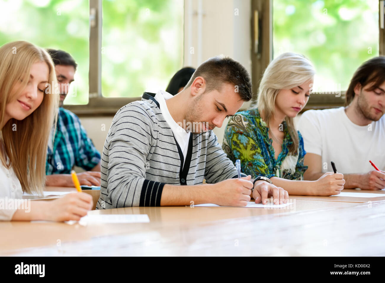 Group of students in class at the university Stock Photo - Alamy